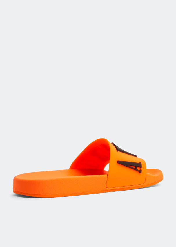 Amiri Logo pool slides for Men - Orange in Kuwait | Level Shoes